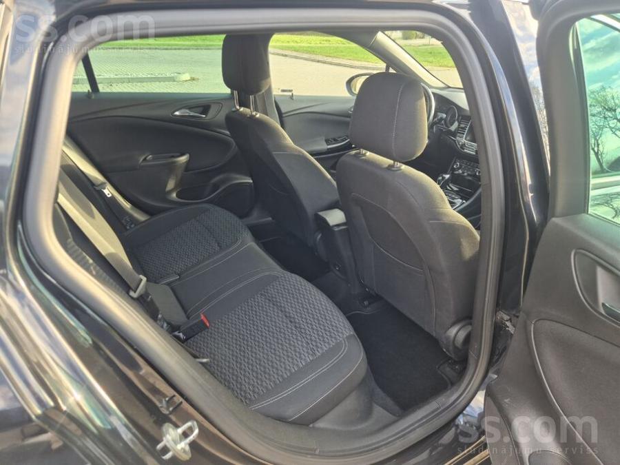 Black Opel Astra 2017 in Cesis, with an engine capacity of 1.60 L and mileage of 300 thousand km for 6000 €, photo 7 on AUTOMOTO.COM.LV