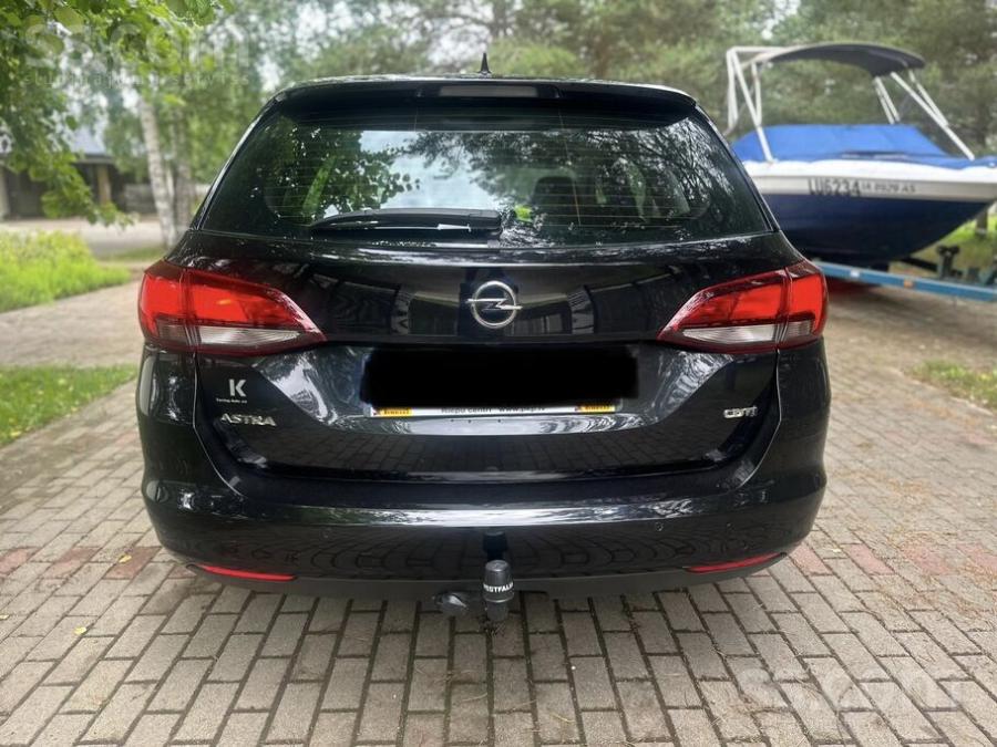 Black Opel Astra 2017 in Jekabpils, with an engine capacity of 1.60 L and mileage of 280 thousand km for 4600 €, photo 6 on AUTOMOTO.COM.LV