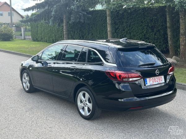 Black Opel Astra 2017 in Kedainiai, with an engine capacity of 1.60 L and mileage of 285 thousand km for 6499 €, photo 4 on AUTOMOTO.COM.LV