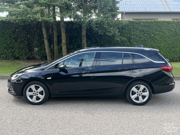 Black Opel Astra 2017 in Kedainiai, with an engine capacity of 1.60 L and mileage of 285 thousand km for 6499 €, photo 6 on AUTOMOTO.COM.LV