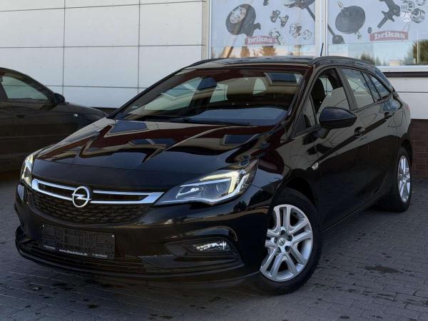 Black Opel Astra 2017 in Kretinga, with an engine capacity of 1.60 L and mileage of 223 thousand km for 5500 €, photo 1 on AUTOMOTO.COM.LV