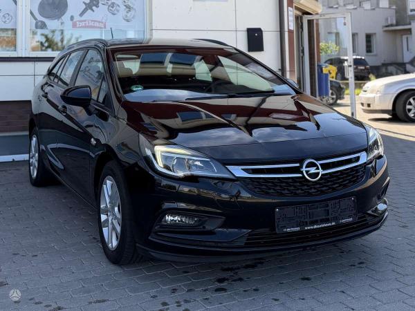 Black Opel Astra 2017 in Kretinga, with an engine capacity of 1.60 L and mileage of 223 thousand km for 5500 €, photo 2 on AUTOMOTO.COM.LV