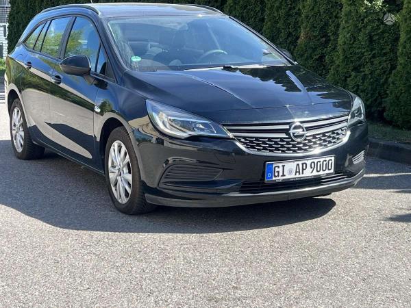 Black Opel Astra 2017 in Kaunas, with an engine capacity of 1.60 L and mileage of 281 thousand km for 5250 €, photo 3 on AUTOMOTO.COM.LV