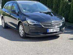 Black Opel Astra 2017 in Kaunas, with an engine capacity of 1.60 L and mileage of 281 thousand km for 5250 €, photo 3 on AUTOMOTO.COM.LV