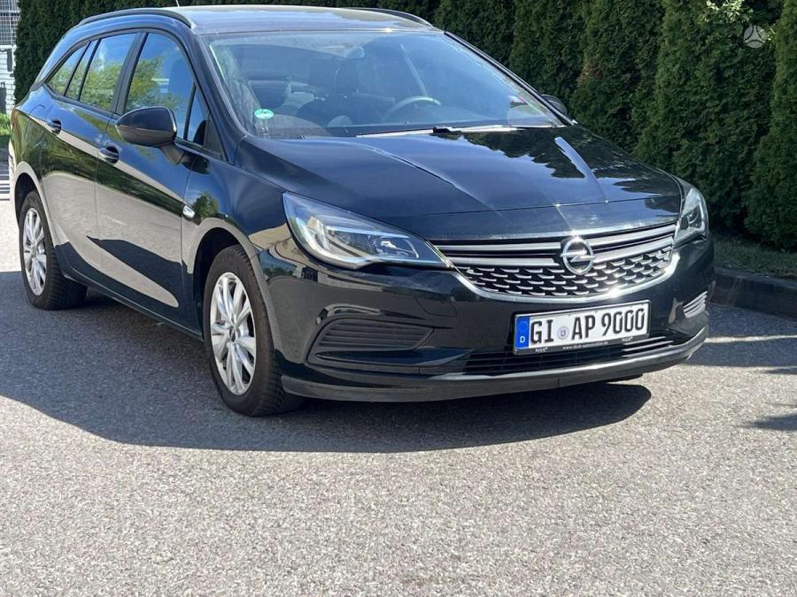 Black Opel Astra 2017 in Kaunas, with an engine capacity of 1.60 L and mileage of 281 thousand km for 5250 €, photo 3 on AUTOMOTO.COM.LV