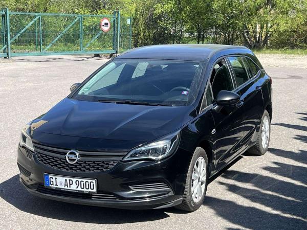 Black Opel Astra 2017 in Kaunas, with an engine capacity of 1.60 L and mileage of 281 thousand km for 5250 €, photo 5 on AUTOMOTO.COM.LV