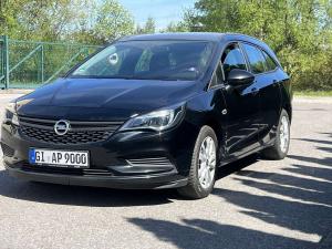 Black Opel Astra 2017 in Kaunas, with an engine capacity of 1.60 L and mileage of 281 thousand km for 5250 €, photo 6 on AUTOMOTO.COM.LV