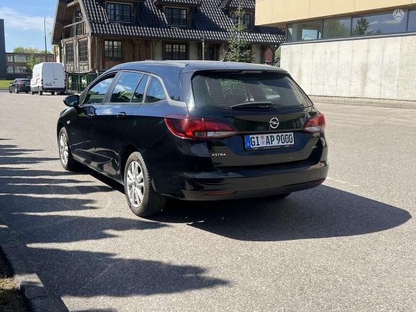 Black Opel Astra 2017 in Kaunas, with an engine capacity of 1.60 L and mileage of 281 thousand km for 5250 €, photo 8 on AUTOMOTO.COM.LV