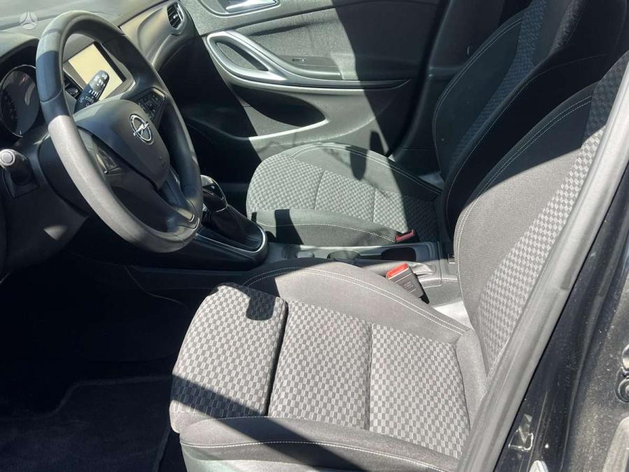 Black Opel Astra 2017 in Kaunas, with an engine capacity of 1.60 L and mileage of 281 thousand km for 5250 €, photo 14 on AUTOMOTO.COM.LV