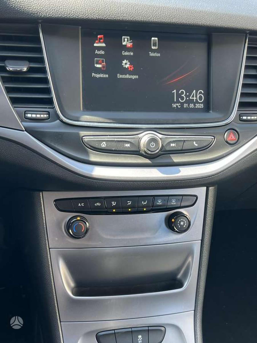 Black Opel Astra 2017 in Kaunas, with an engine capacity of 1.60 L and mileage of 281 thousand km for 5250 €, photo 15 on AUTOMOTO.COM.LV