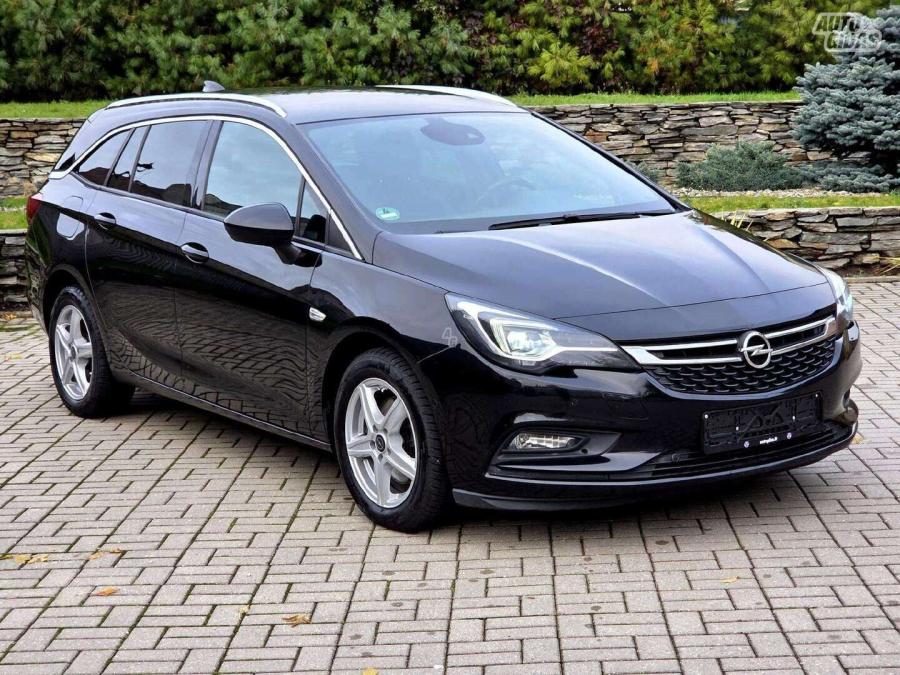 Black Opel Astra 2018 in Vilnius, with an engine capacity of 1.60 L and mileage of 267 thousand km for 6600 €, photo 1 on AUTOMOTO.COM.LV
