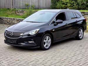Black Opel Astra 2018 in Vilnius, with an engine capacity of 1.60 L and mileage of 267 thousand km for 6600 €, photo 4 on AUTOMOTO.COM.LV