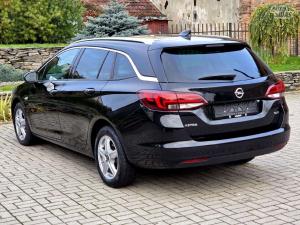Black Opel Astra 2018 in Vilnius, with an engine capacity of 1.60 L and mileage of 267 thousand km for 6600 €, photo 6 on AUTOMOTO.COM.LV
