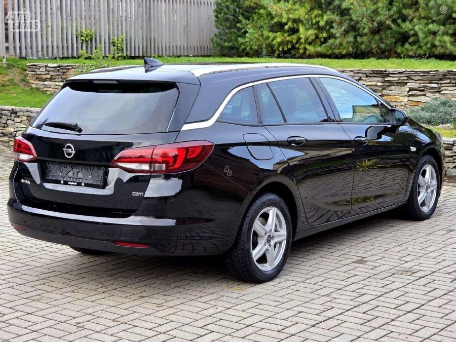 Black Opel Astra 2018 in Vilnius, with an engine capacity of 1.60 L and mileage of 267 thousand km for 6600 €, photo 9 on AUTOMOTO.COM.LV