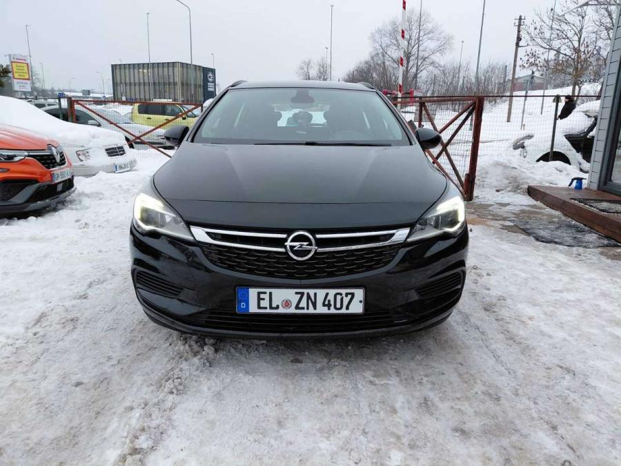 Black Opel Astra 2018 in Klaipeda, with an engine capacity of 1.60 L and mileage of 213 thousand km for 4999 €, photo 1 on AUTOMOTO.COM.LV