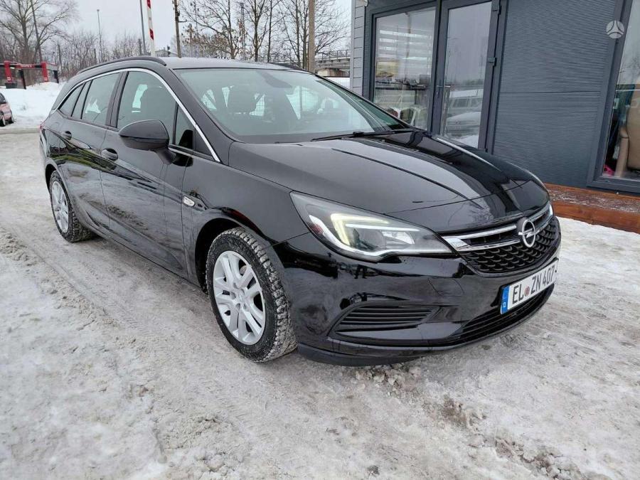 Black Opel Astra 2018 in Klaipeda, with an engine capacity of 1.60 L and mileage of 213 thousand km for 4999 €, photo 2 on AUTOMOTO.COM.LV