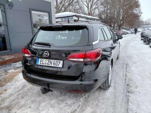 Black Opel Astra 2018 in Klaipeda, with an engine capacity of 1.60 L and mileage of 213 thousand km for 4999 €, photo 7 on AUTOMOTO.COM.LV