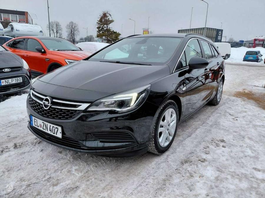 Black Opel Astra 2018 in Klaipeda, with an engine capacity of 1.60 L and mileage of 213 thousand km for 4999 €, photo 20 on AUTOMOTO.COM.LV