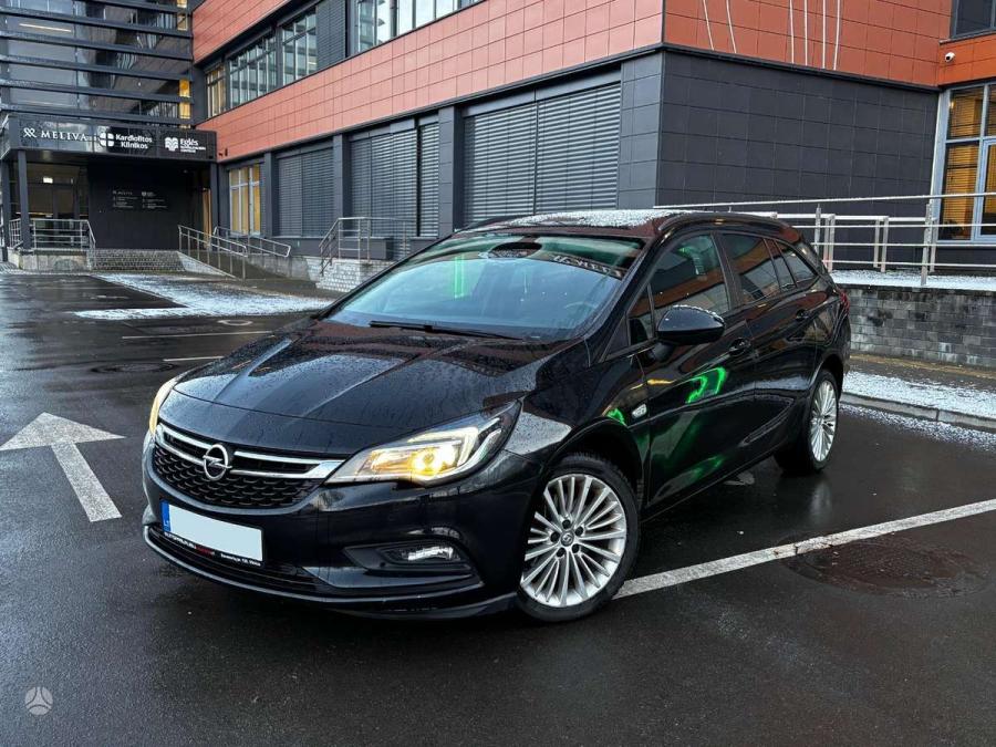 Black Opel Astra 2018 in Vilnius, with an engine capacity of 1.60 L and mileage of 167 thousand km for 7300 €, photo 1 on AUTOMOTO.COM.LV
