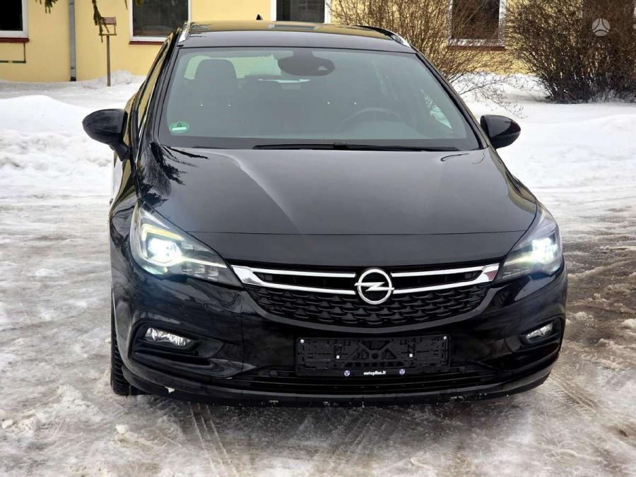 Black Opel Astra 2018 in Kedainiai, with an engine capacity of 1.60 L and mileage of 267 thousand km for 6350 €, photo 2 on AUTOMOTO.COM.LV