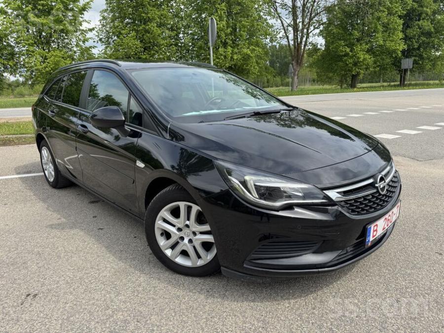 Black Opel Astra 2018 in Ogre, with an engine capacity of 1.60 L and mileage of 179 thousand km for 7550 €, photo 1 on AUTOMOTO.COM.LV