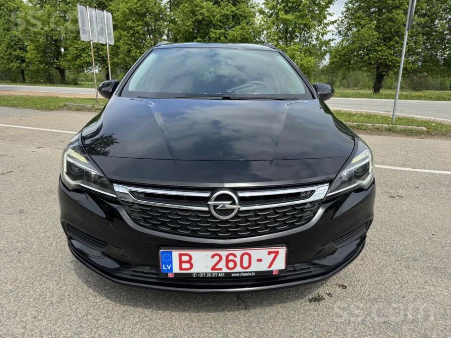 Black Opel Astra 2018 in Ogre, with an engine capacity of 1.60 L and mileage of 179 thousand km for 7550 €, photo 4 on AUTOMOTO.COM.LV