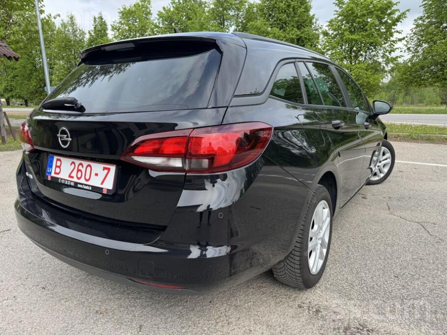 Black Opel Astra 2018 in Ogre, with an engine capacity of 1.60 L and mileage of 179 thousand km for 7550 €, photo 12 on AUTOMOTO.COM.LV