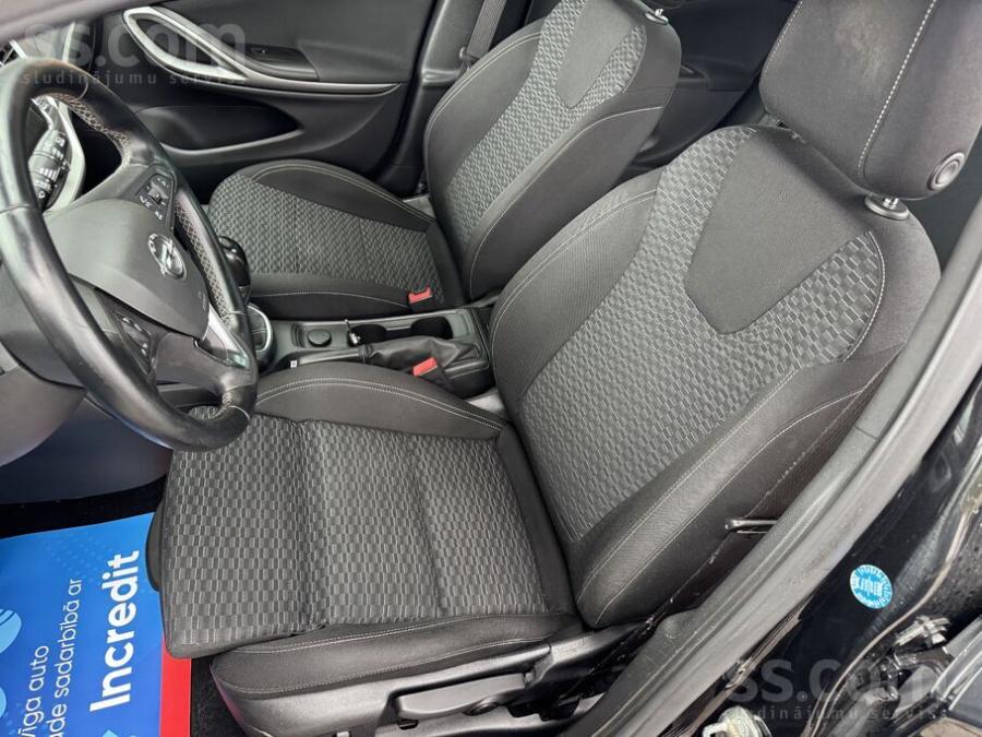 Black Opel Astra 2018 in Ogre, with an engine capacity of 1.60 L and mileage of 179 thousand km for 7550 €, photo 23 on AUTOMOTO.COM.LV