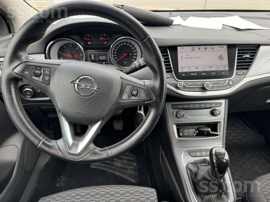 Black Opel Astra 2018 in Ogre, with an engine capacity of 1.60 L and mileage of 179 thousand km for 7550 €, photo 26 on AUTOMOTO.COM.LV