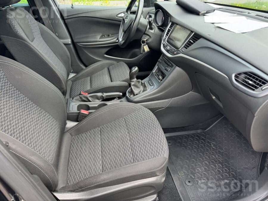 Black Opel Astra 2018 in Ogre, with an engine capacity of 1.60 L and mileage of 179 thousand km for 7550 €, photo 27 on AUTOMOTO.COM.LV
