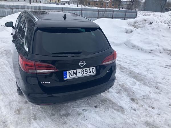 Black Opel Astra 2018 in Jekabpils, with an engine capacity of 1.60 L and mileage of 170 thousand km for 8000 €, photo 4 on AUTOMOTO.COM.LV