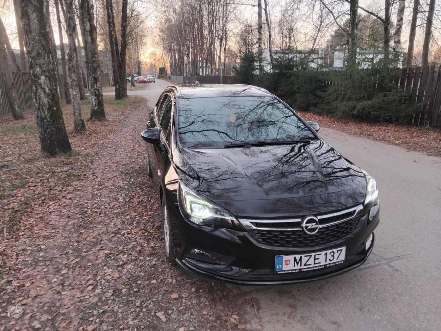 Black Opel Astra 2018 in Vilnius, with an engine capacity of 1.60 L and mileage of 212 thousand km for 8150 €, photo 1 on AUTOMOTO.COM.LV