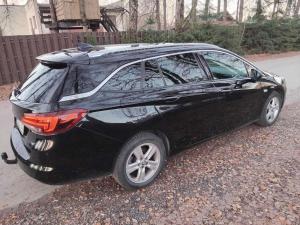 Black Opel Astra 2018 in Vilnius, with an engine capacity of 1.60 L and mileage of 212 thousand km for 8150 €, photo 5 on AUTOMOTO.COM.LV