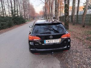 Black Opel Astra 2018 in Vilnius, with an engine capacity of 1.60 L and mileage of 212 thousand km for 8150 €, photo 6 on AUTOMOTO.COM.LV