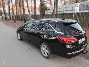 Black Opel Astra 2018 in Vilnius, with an engine capacity of 1.60 L and mileage of 212 thousand km for 8150 €, photo 7 on AUTOMOTO.COM.LV