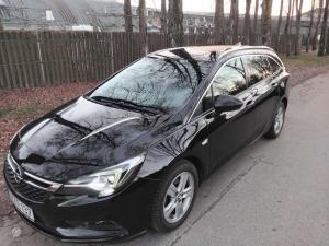 Black Opel Astra 2018 in Vilnius, with an engine capacity of 1.60 L and mileage of 212 thousand km for 8150 €, photo 8 on AUTOMOTO.COM.LV