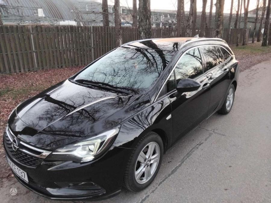Black Opel Astra 2018 in Vilnius, with an engine capacity of 1.60 L and mileage of 212 thousand km for 8150 €, photo 8 on AUTOMOTO.COM.LV