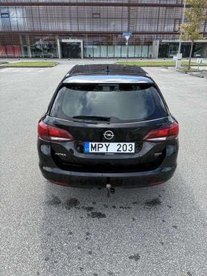 Black Opel Astra 2018 in Klaipeda, with an engine capacity of 1.60 L and mileage of 240 thousand km for 6000 €, photo 9 on AUTOMOTO.COM.LV