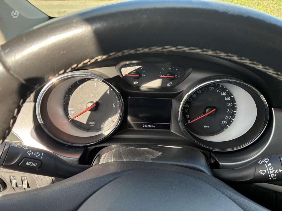 Black Opel Astra 2018 in Klaipeda, with an engine capacity of 1.60 L and mileage of 240 thousand km for 6000 €, photo 13 on AUTOMOTO.COM.LV