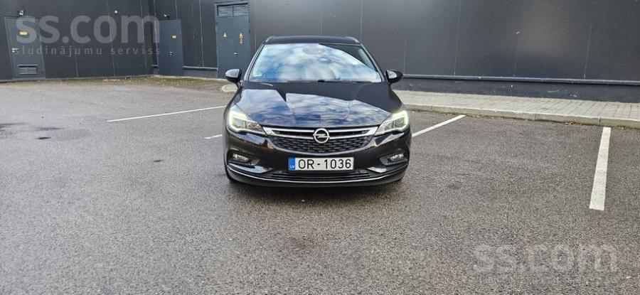 Black Opel Astra 2018 in Riga, with an engine capacity of 1.60 L and mileage of 139 thousand km for 7150 €, photo 3 on AUTOMOTO.COM.LV