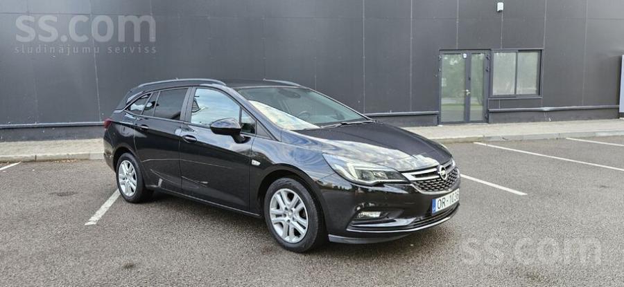 Black Opel Astra 2018 in Riga, with an engine capacity of 1.60 L and mileage of 139 thousand km for 7150 €, photo 6 on AUTOMOTO.COM.LV