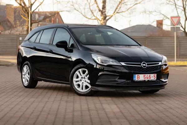 Black Opel Astra 2019 in Jelgava, with an engine capacity of 1.60 L and mileage of 171 thousand km for 8900 €, photo 2 on AUTOMOTO.COM.LV