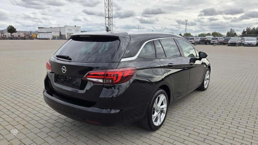 Black Opel Astra 2019 in Marijampole, with an engine capacity of 1.60 L and mileage of 180 thousand km for 7400 €, photo 4 on AUTOMOTO.COM.LV