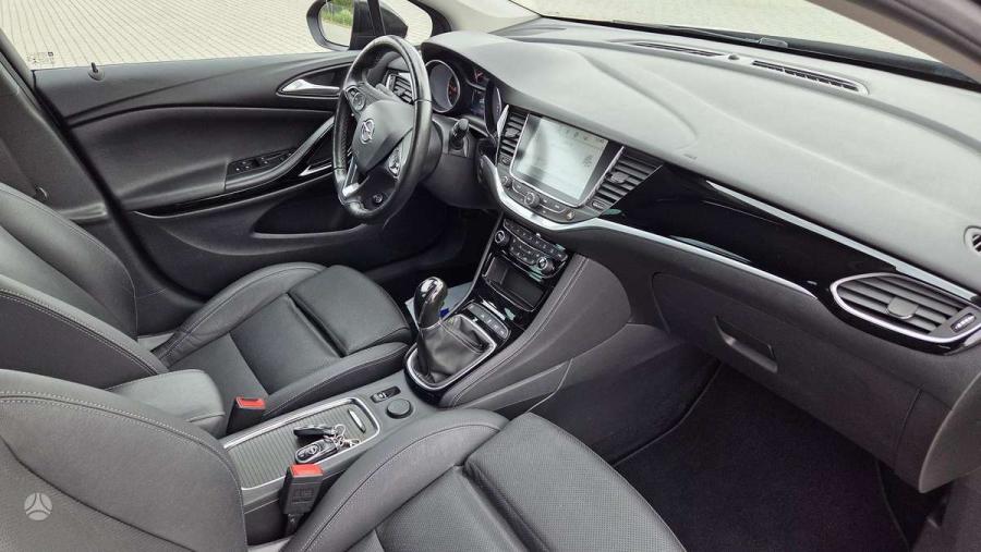 Black Opel Astra 2019 in Marijampole, with an engine capacity of 1.60 L and mileage of 180 thousand km for 7400 €, photo 16 on AUTOMOTO.COM.LV