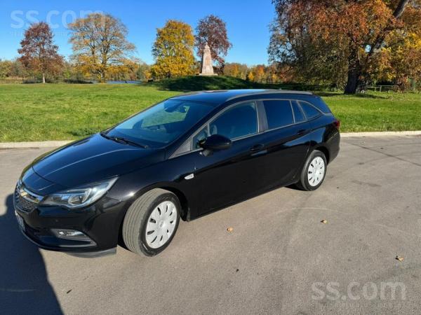 Black Opel Astra 2020 in Riga, with an engine capacity of 1.60 L and mileage of 125 thousand km for 7700 €, photo 2 on AUTOMOTO.COM.LV