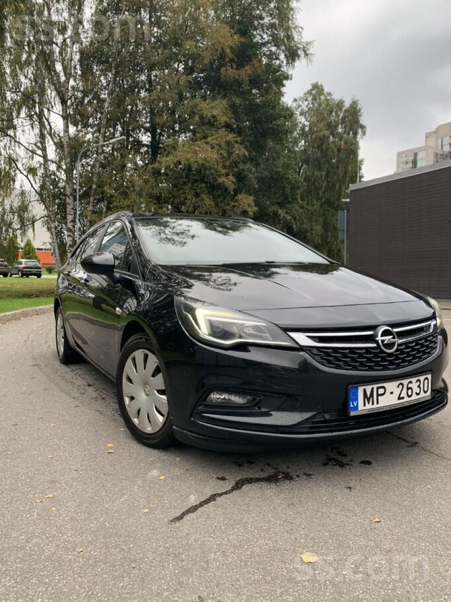 Black Opel Astra 2020 in Riga, with an engine capacity of 1.60 L and mileage of 157 thousand km for 6300 €, photo 3 on AUTOMOTO.COM.LV