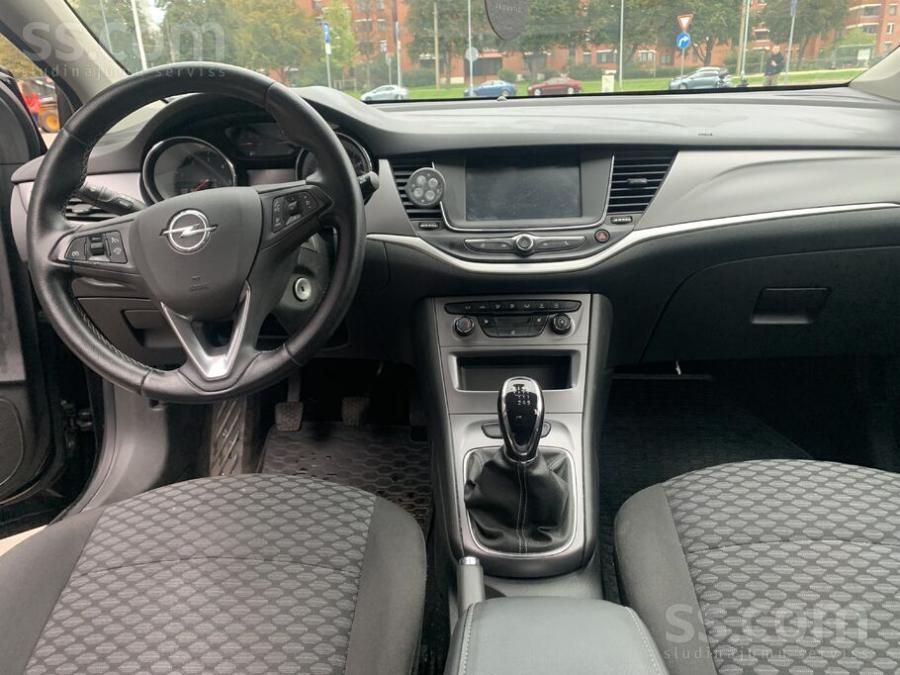 Black Opel Astra 2020 in Riga, with an engine capacity of 1.60 L and mileage of 157 thousand km for 6300 €, photo 8 on AUTOMOTO.COM.LV