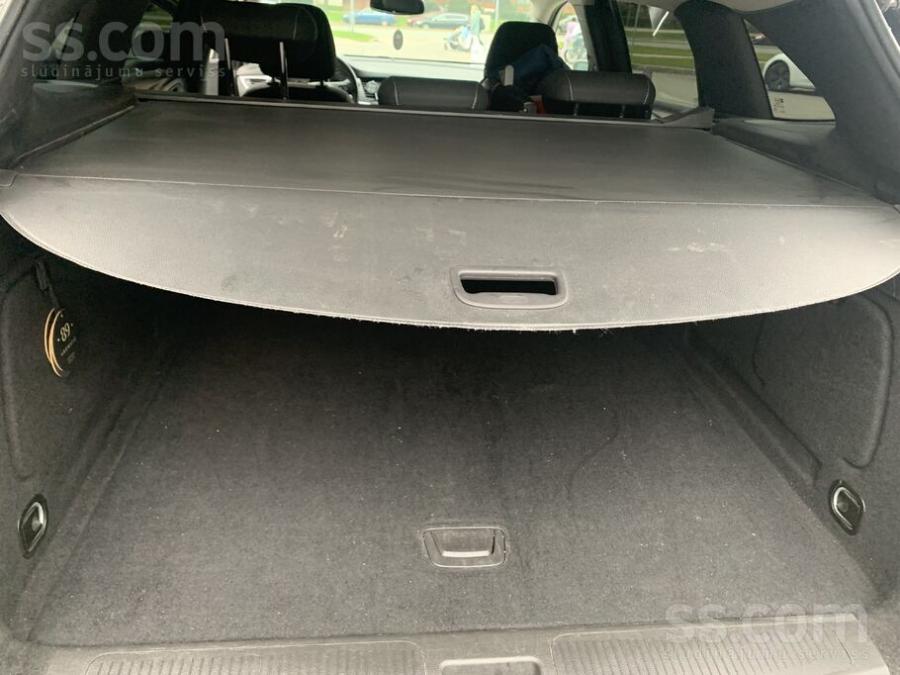 Black Opel Astra 2020 in Riga, with an engine capacity of 1.60 L and mileage of 157 thousand km for 6300 €, photo 11 on AUTOMOTO.COM.LV