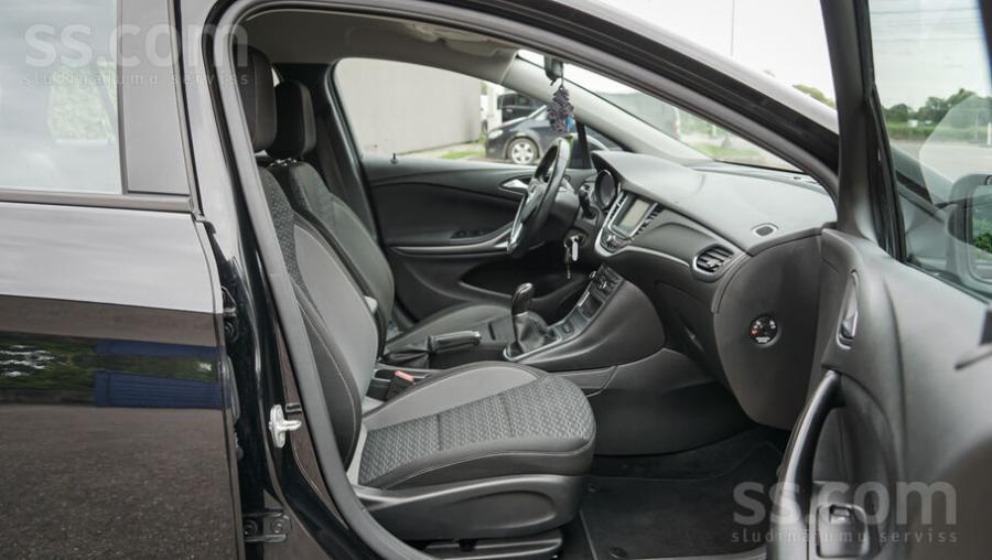Black Opel Astra 2021 in Riga, with an engine capacity of 1.50 L and mileage of 205 thousand km for 6950 €, photo 11 on AUTOMOTO.COM.LV