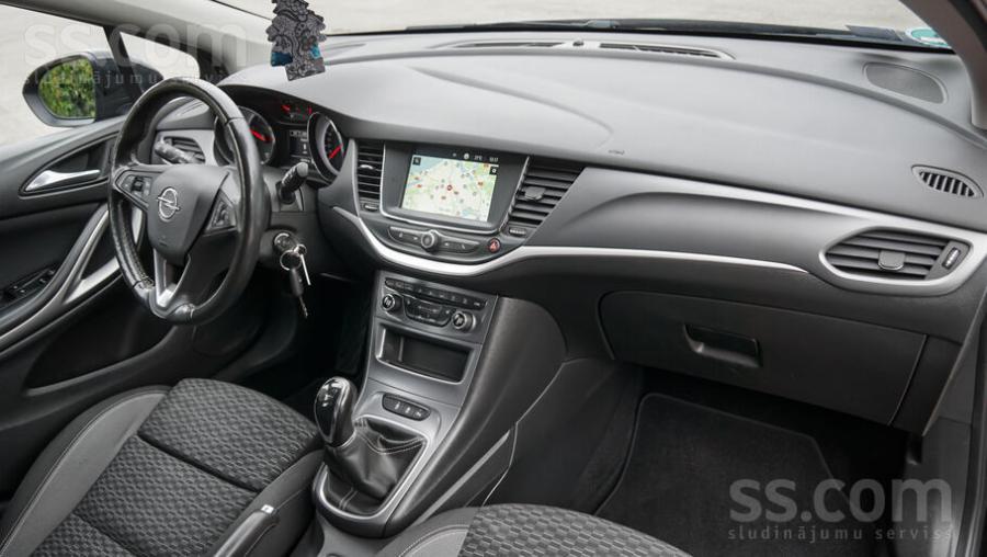Black Opel Astra 2021 in Riga, with an engine capacity of 1.50 L and mileage of 205 thousand km for 6950 €, photo 12 on AUTOMOTO.COM.LV